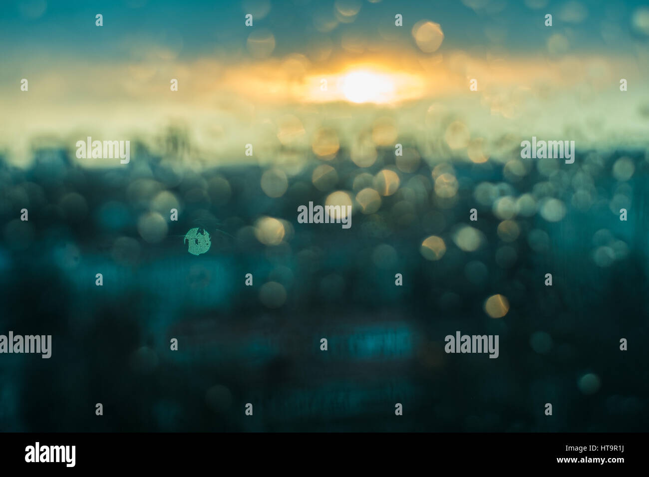 Unfocuced sun and water drops on the window Stock Photo - Alamy