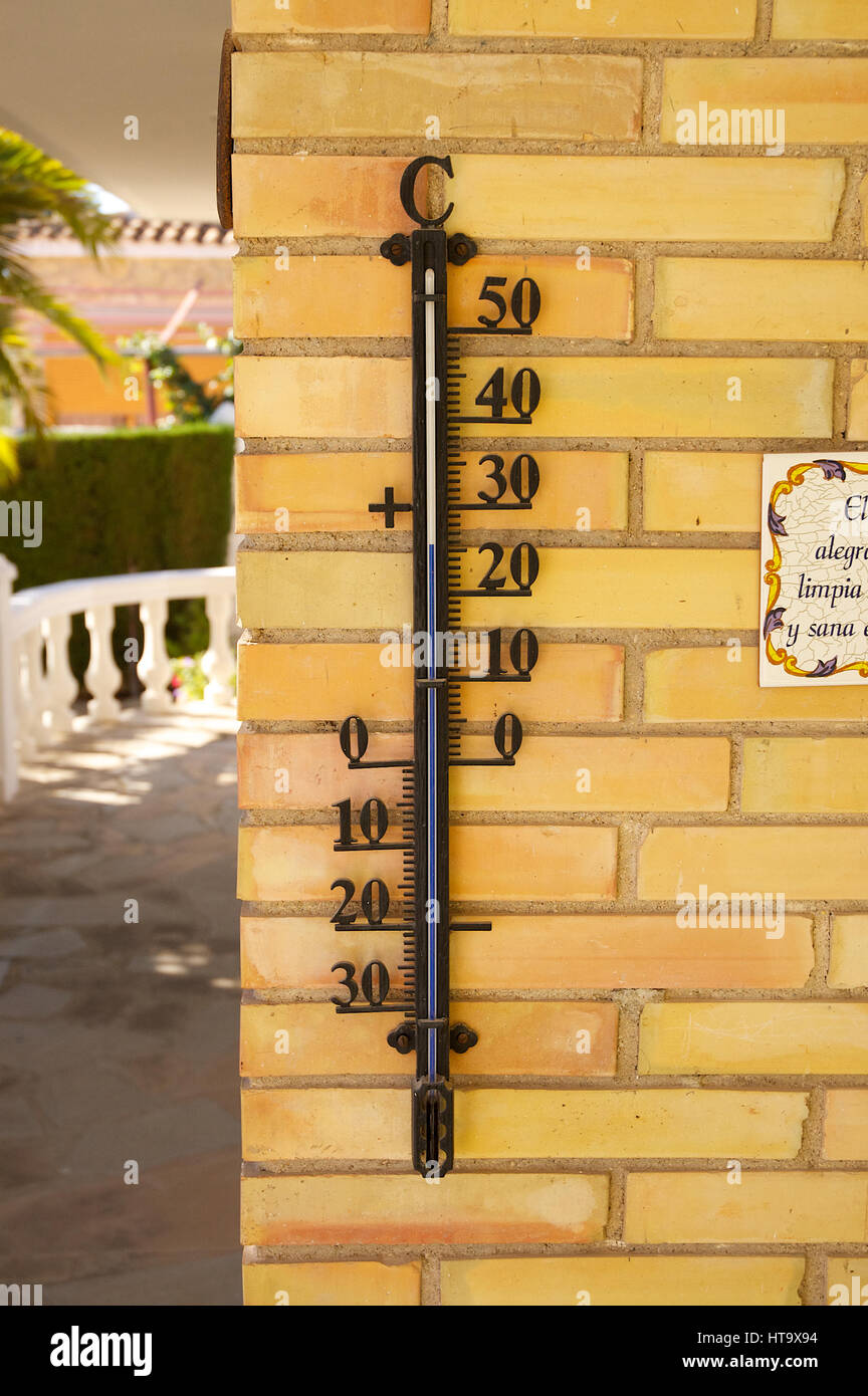 Thermometer on the wall of a Villa in Benidorm, Alicante, Spain Stock ...