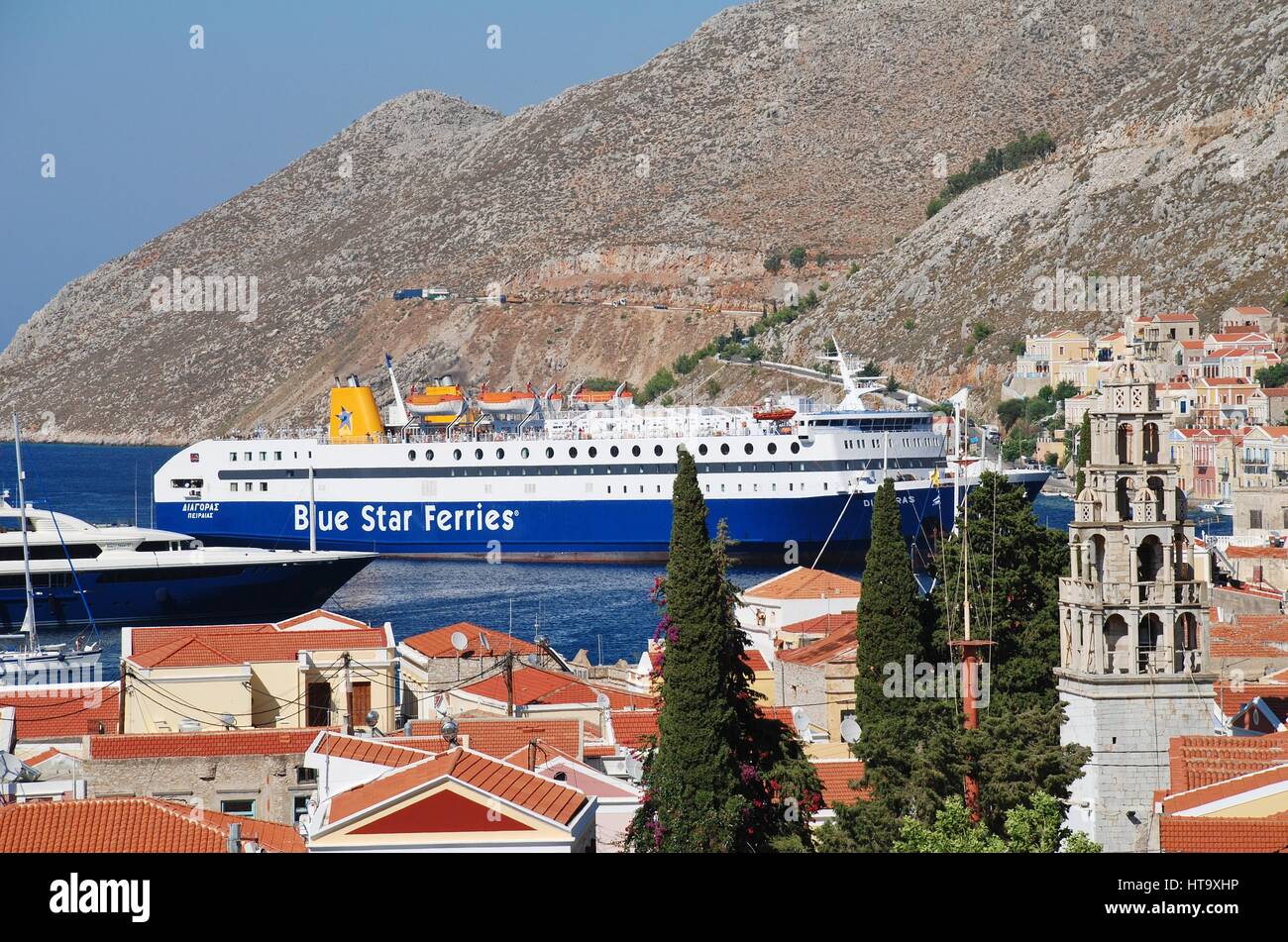 Blue Star Ferries ferry boat Diagoras docking at Yialos harbour on the ...