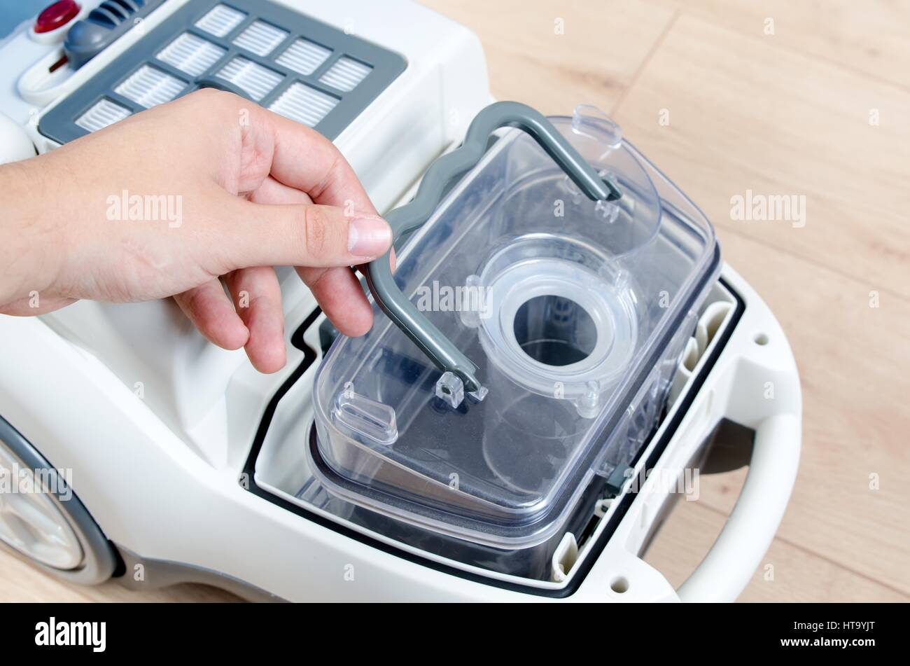 Two in one bag less vacuum cleaner with plastic container Stock Photo ...