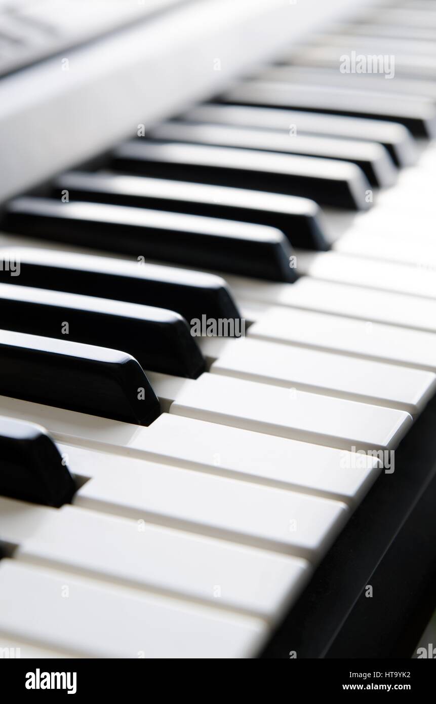 Piano keys of electronic keyboard instrument. Close up photo Stock ...