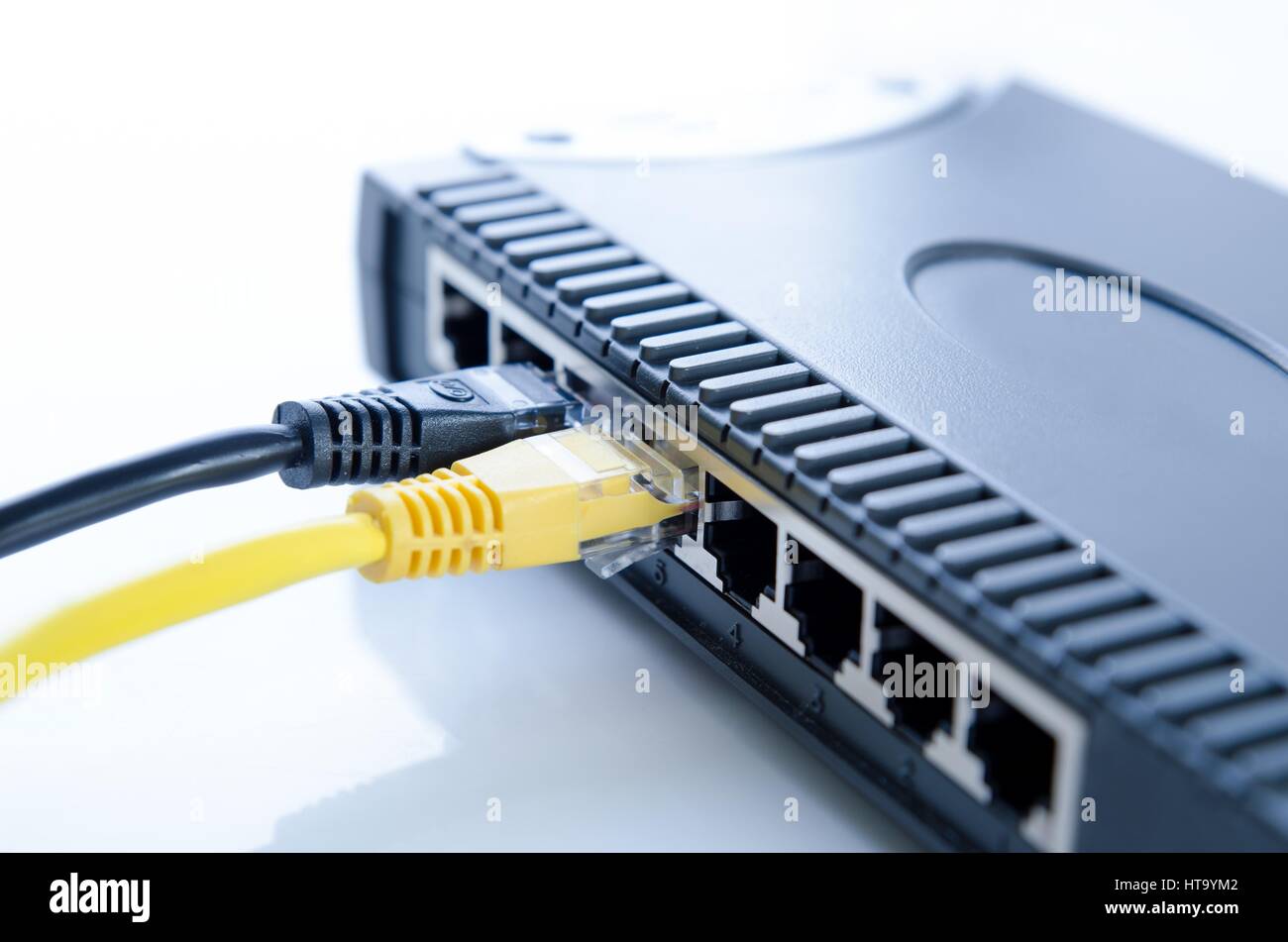 Network switch device and ethernet cables on white background Stock ...