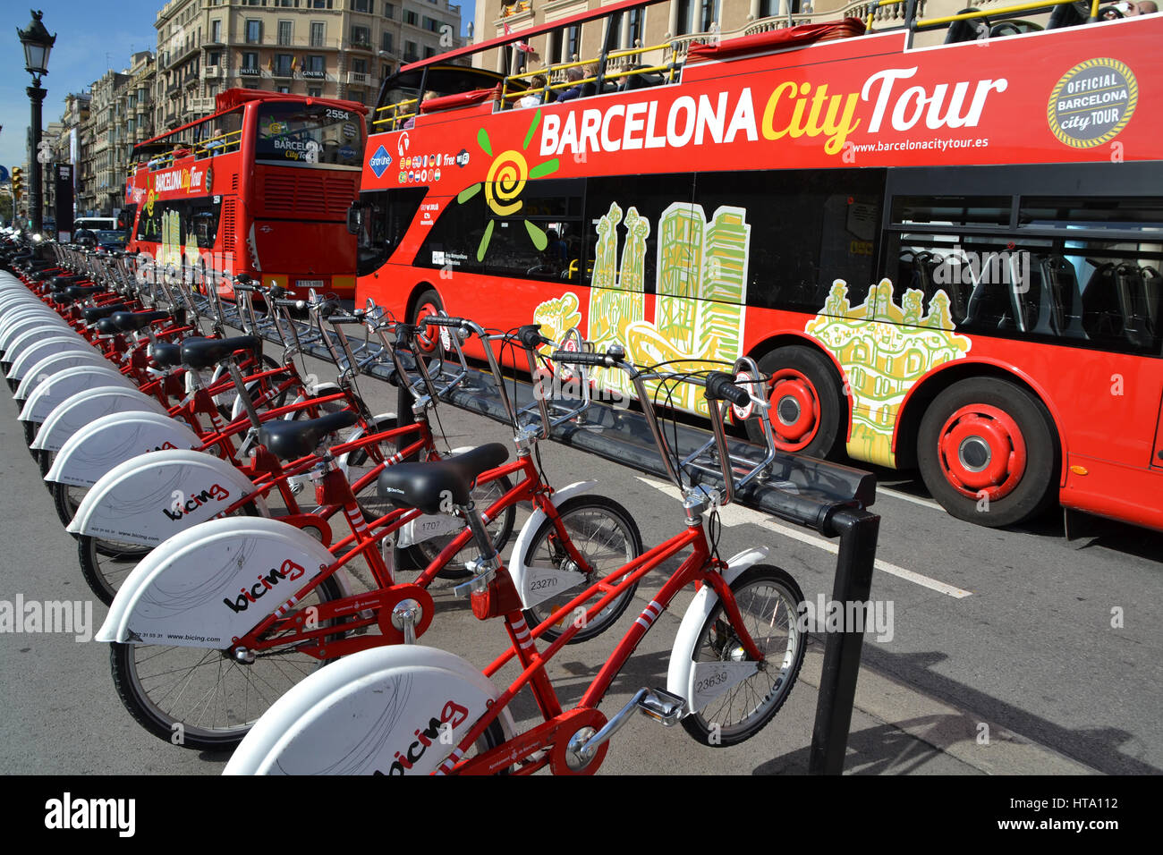 Bikes and Tourist Bus in Barcelona, Spain Stock Photo - Alamy