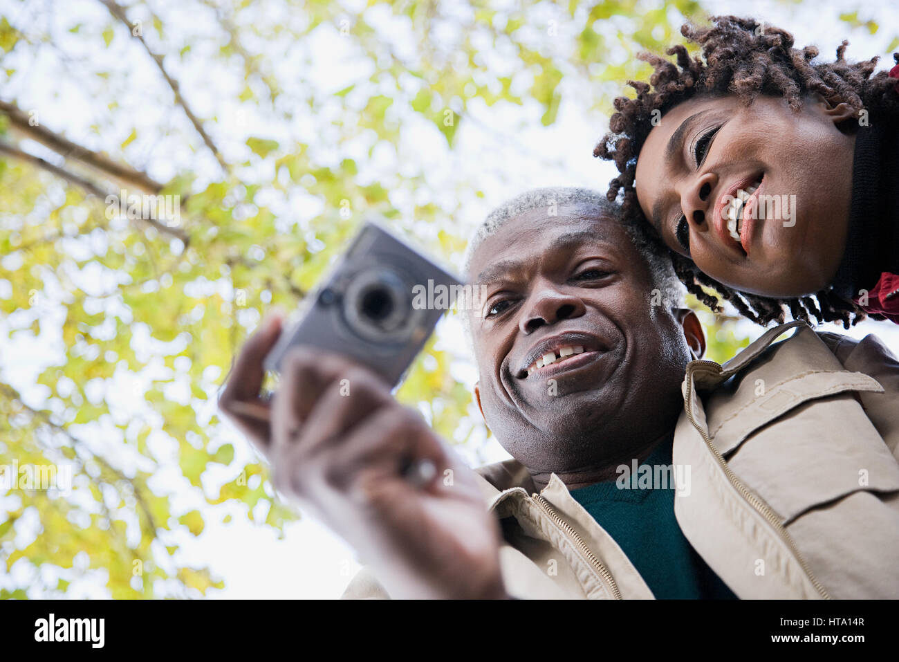 the couple using a camera Stock Photo - Alamy