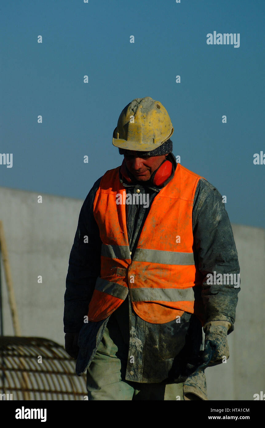 workers at work on site with caterpillar construction equipment Stock ...