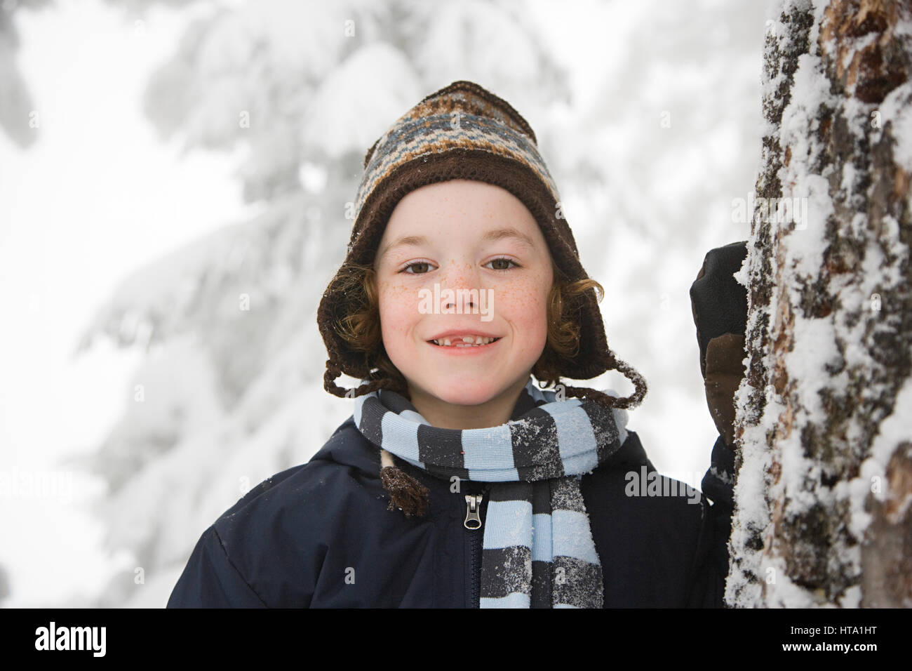 Boy in snow Stock Photo - Alamy
