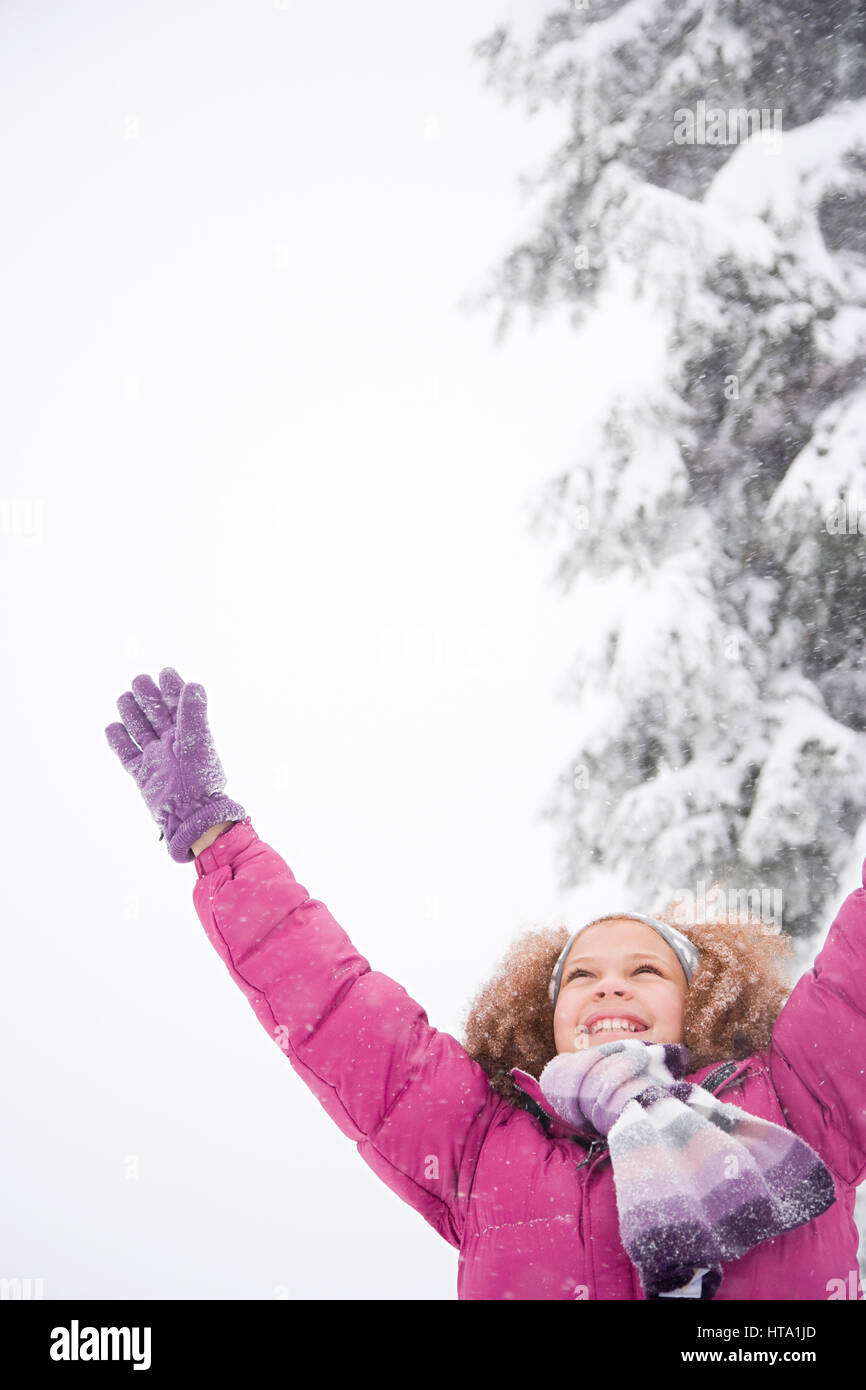 Girl in the snow Stock Photo - Alamy