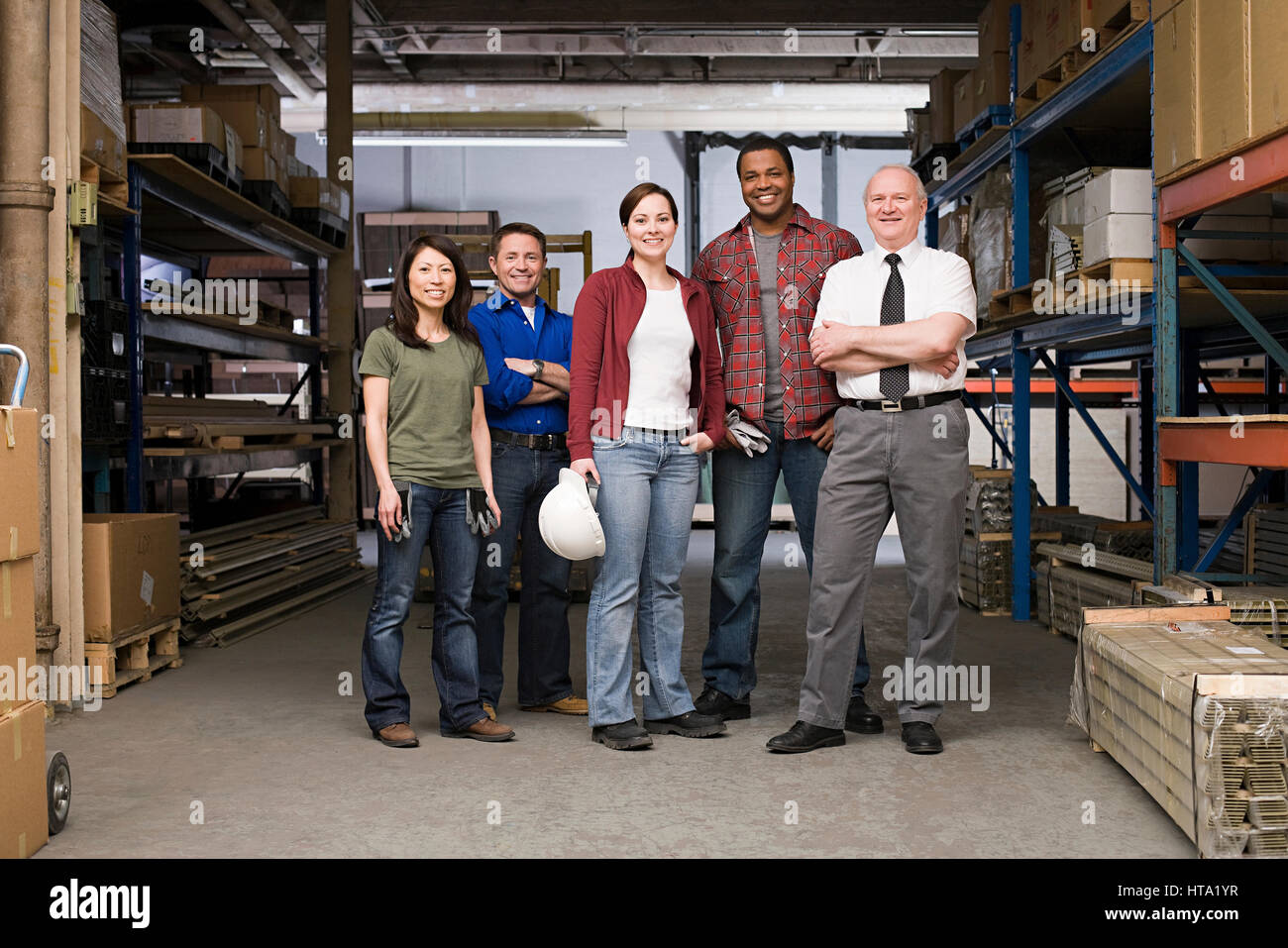 Workers in warehouse Stock Photo - Alamy