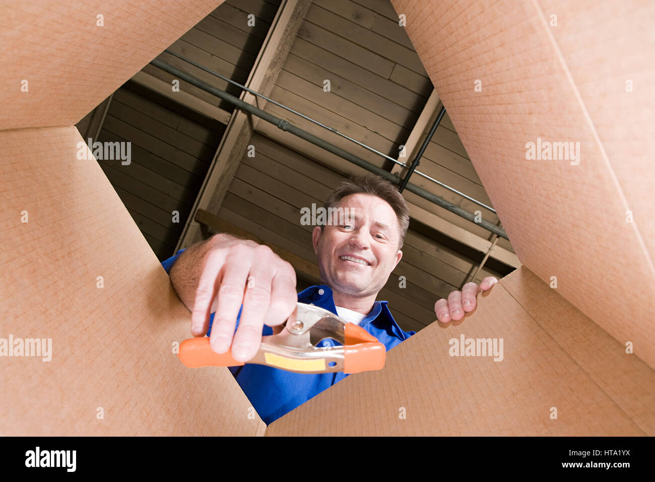 Man and cardboard box Stock Photo - Alamy