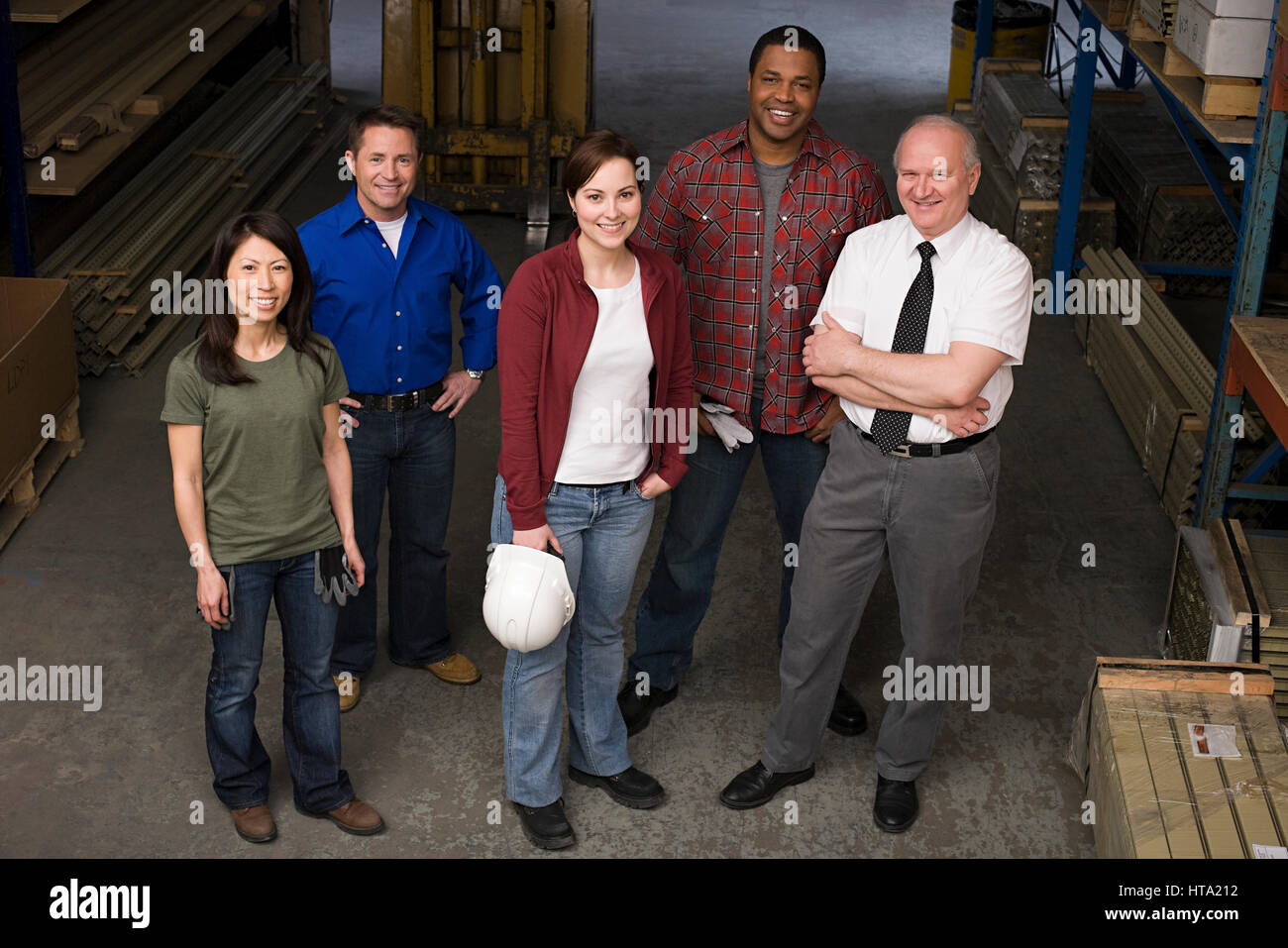Colleagues in warehouse Stock Photo - Alamy