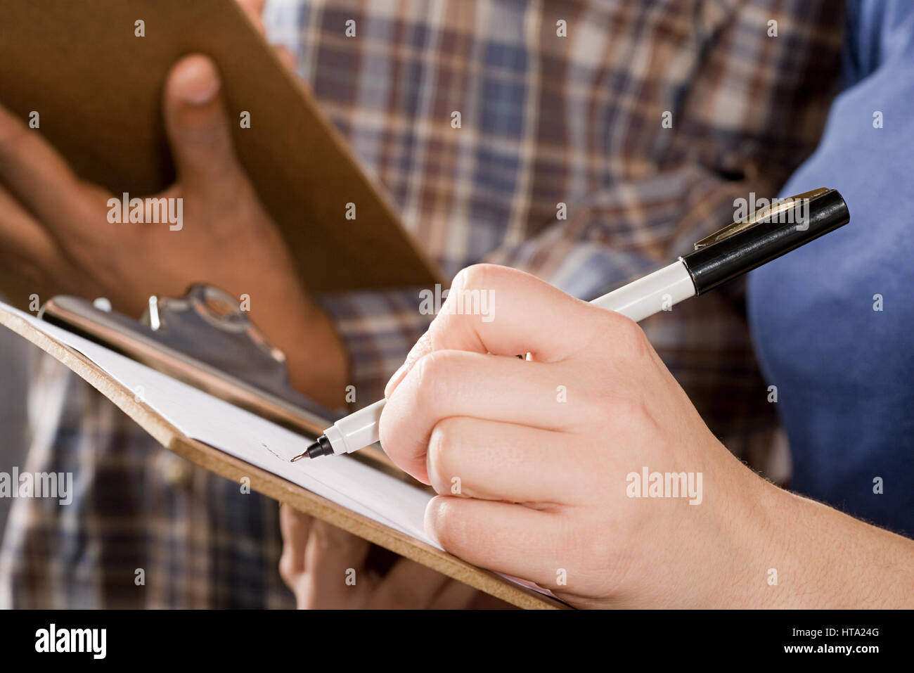 People with clipboards Stock Photo - Alamy