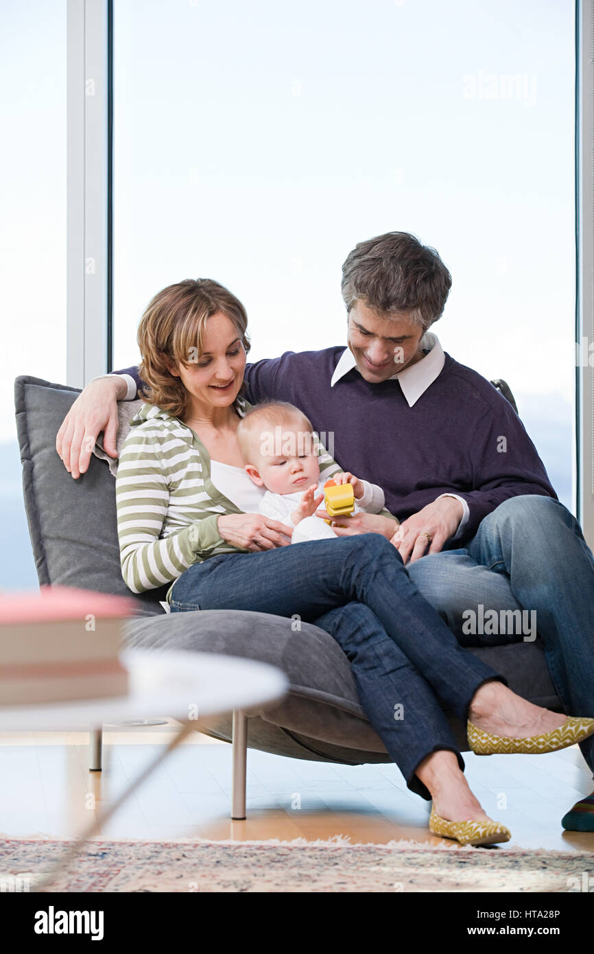 Parents and their baby Stock Photo - Alamy