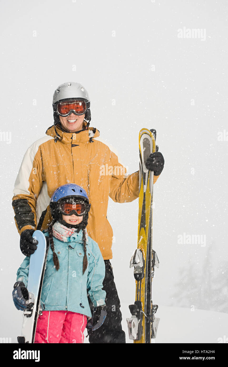 Father daughter playing snow hi-res stock photography and images - Alamy