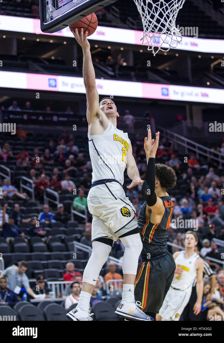 Las Vegas, NV, USA. 07th Mar, 2017. A. Cal guard Sam Singer (2) drive ...