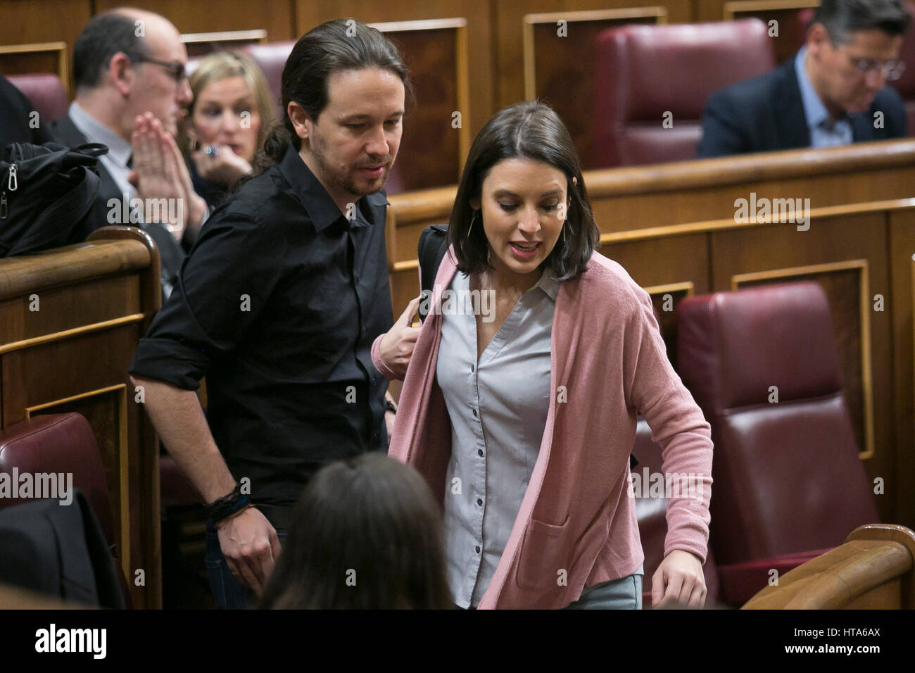 Podemos leader Pablo Iglesias and Podemos spokesperson Irene Montero ...
