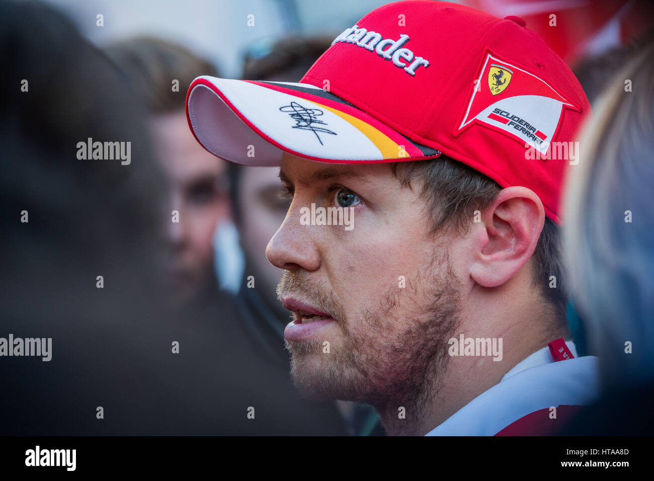 German Formula One pilot Sebastian Vettel of Ferrari speaks to ...