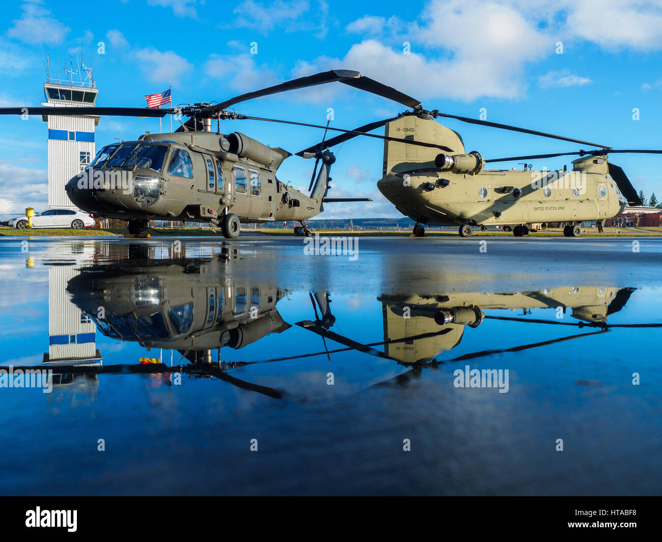 Illesheim, Germany. 9th Mar, 2017. A Boeing CH-47 Chinook (r) and a ...