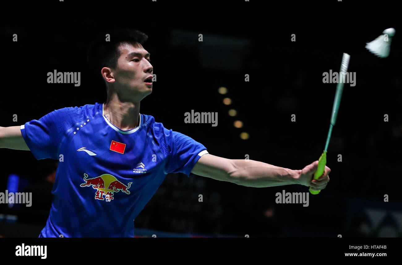 Birmingham. 9th Mar, 2017. China's Zhao Junpeng returns the shuttlecock during the men's single ...