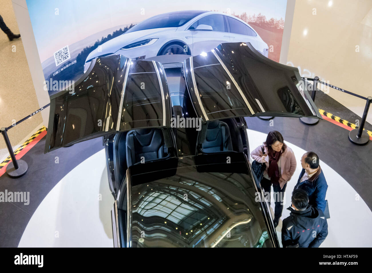 Shanghai, China. 9th Mar, 2017. A black Tesla Model X shows at a ...