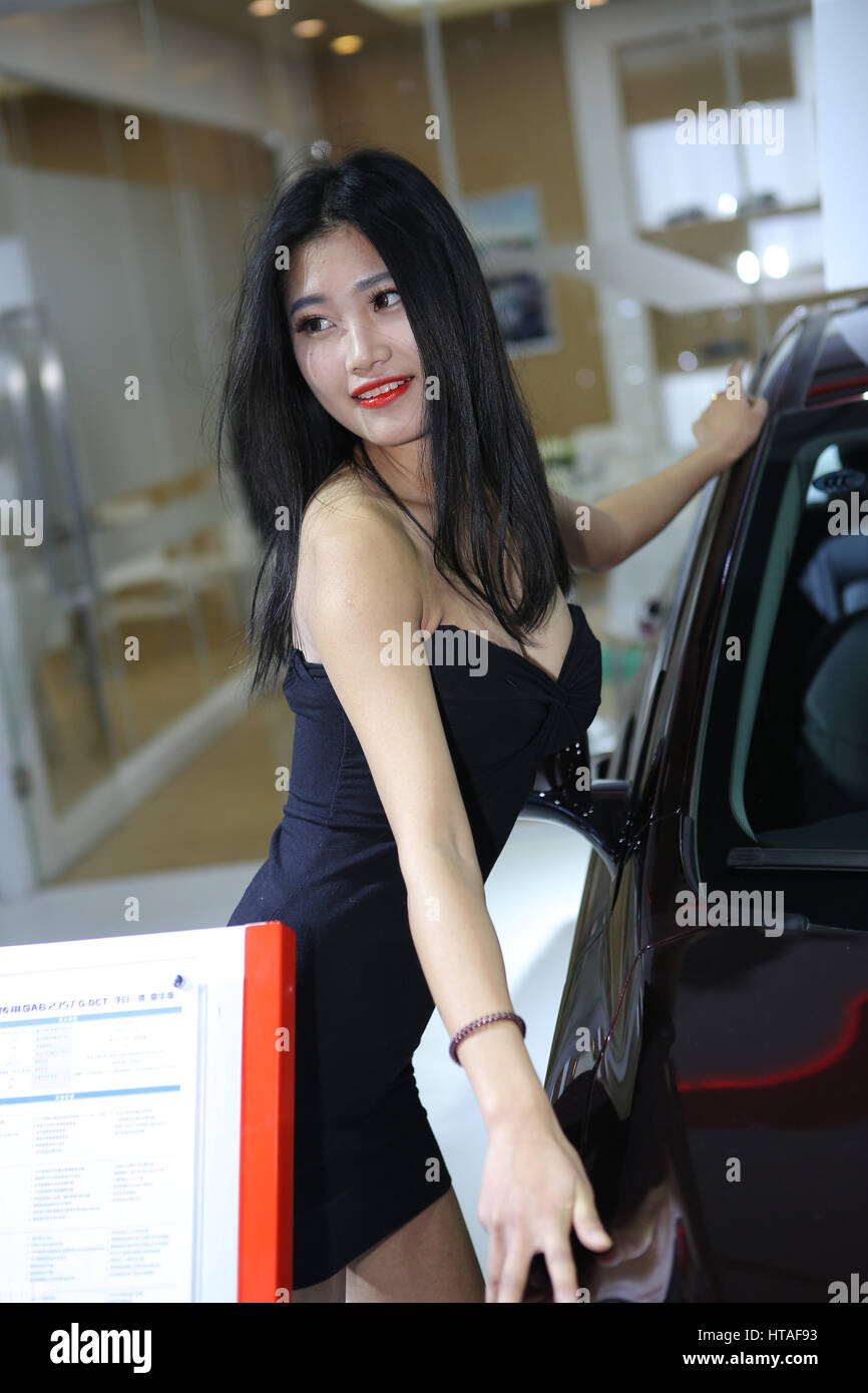 Weifang, China. 9th Mar, 2017. A car model at an auto expo in Weifang ...
