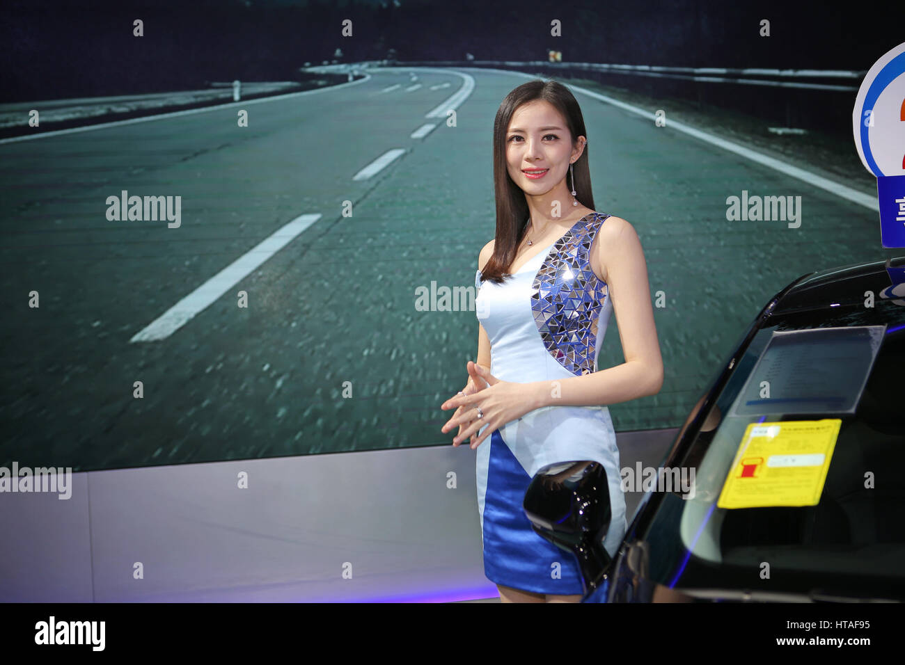 Weifang, China. 9th Mar, 2017. A car model at an auto expo in Weifang ...
