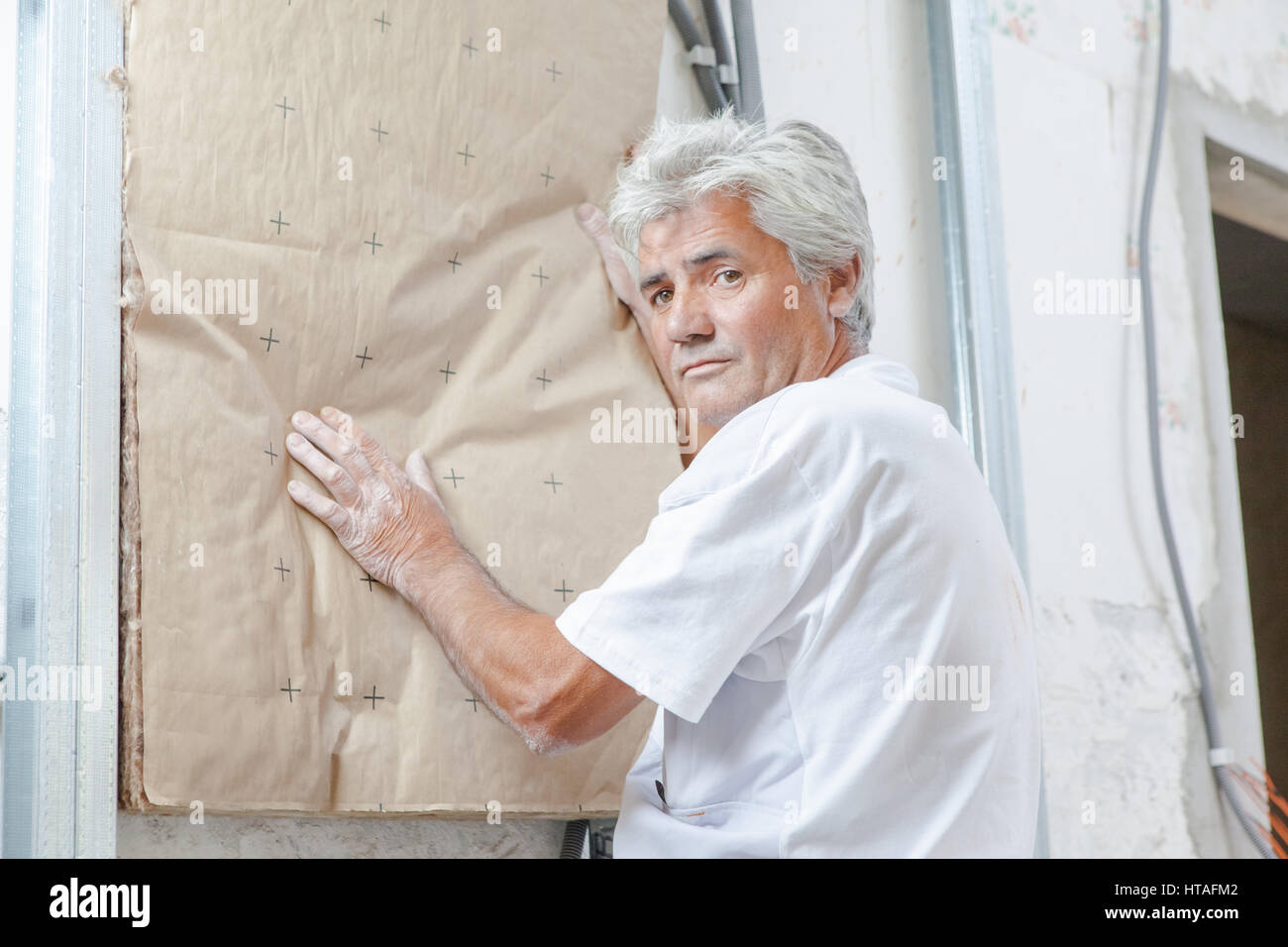 Holding plaster board hi-res stock photography and images - Alamy