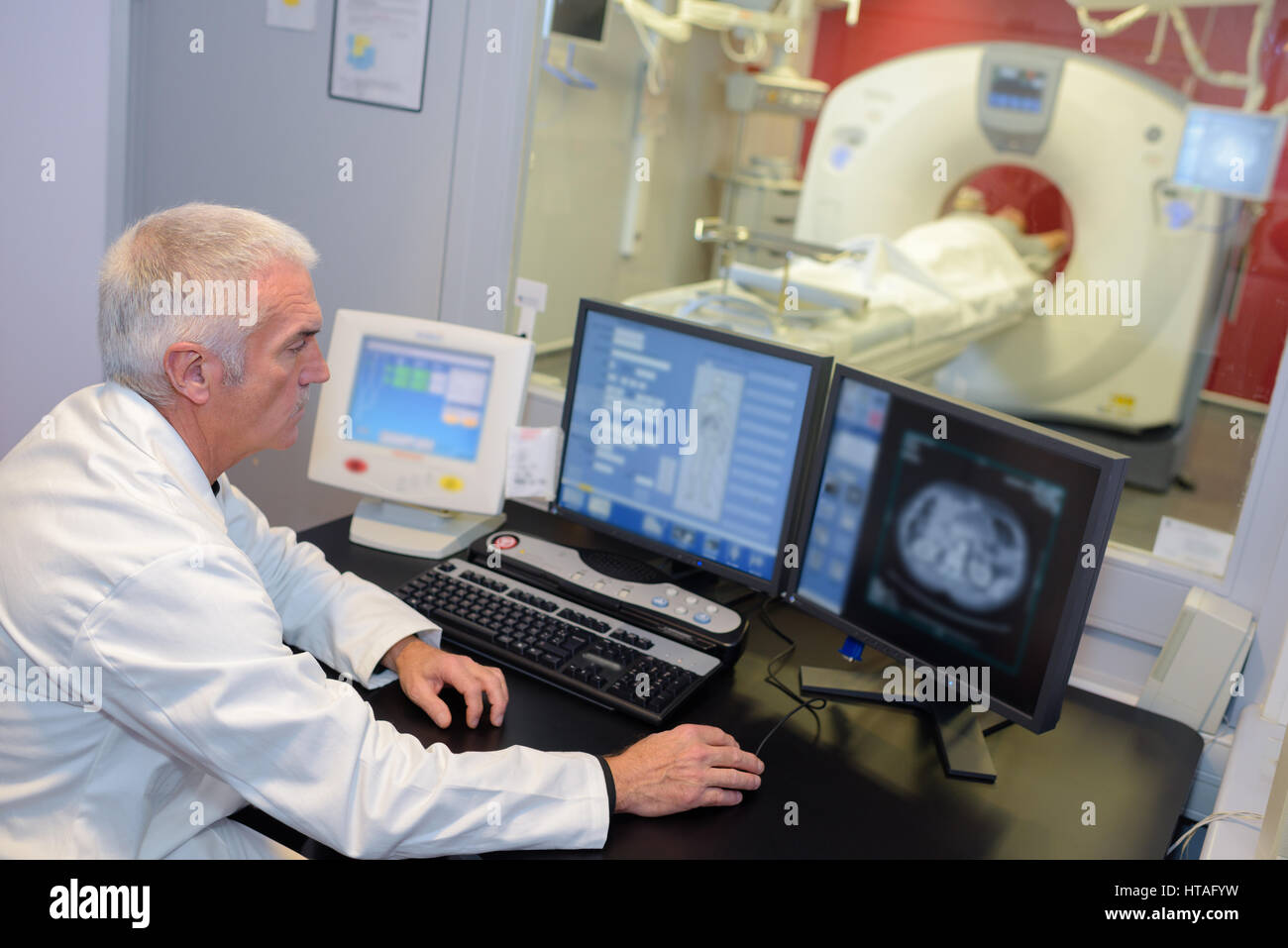 MRI technologist monitoring the screen Stock Photo - Alamy