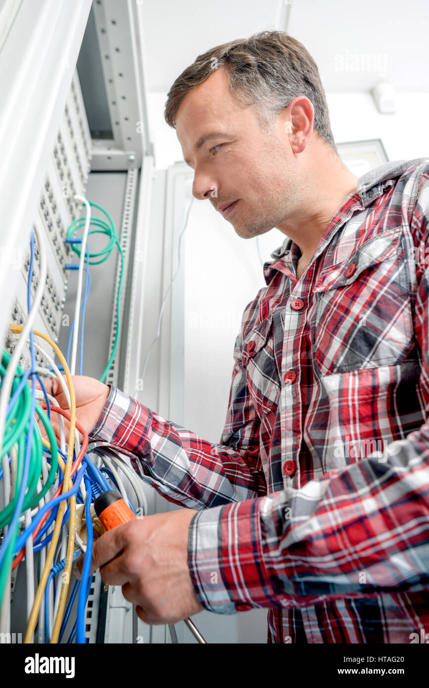 Man repairing server Stock Photo - Alamy