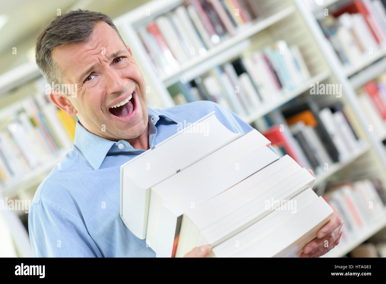 men with books Stock Photo - Alamy