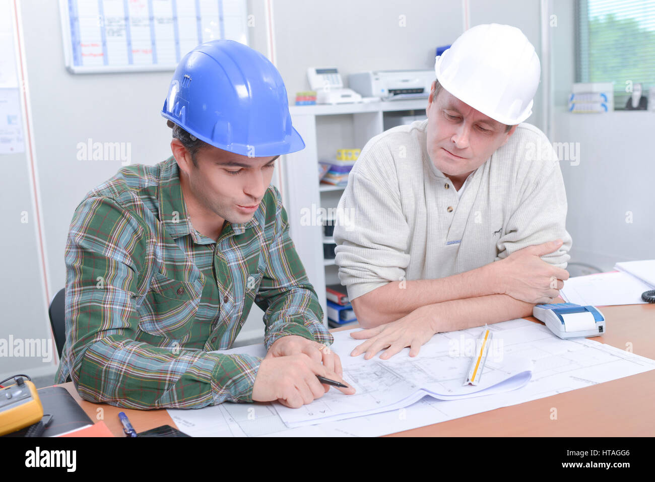 twon men in office Stock Photo - Alamy