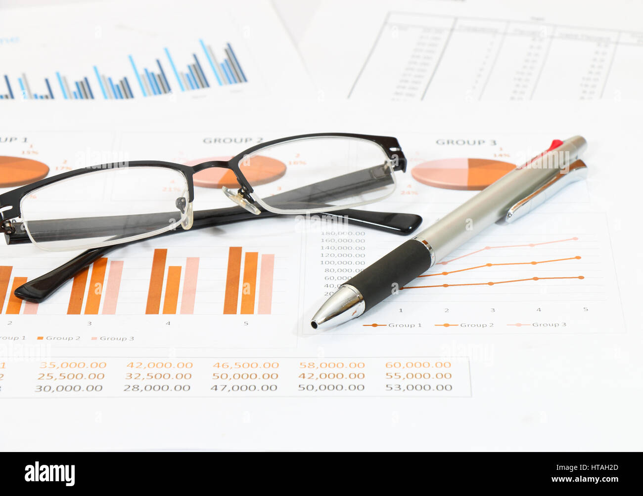 closeup Image of graph and chart report on desk at the office Stock ...