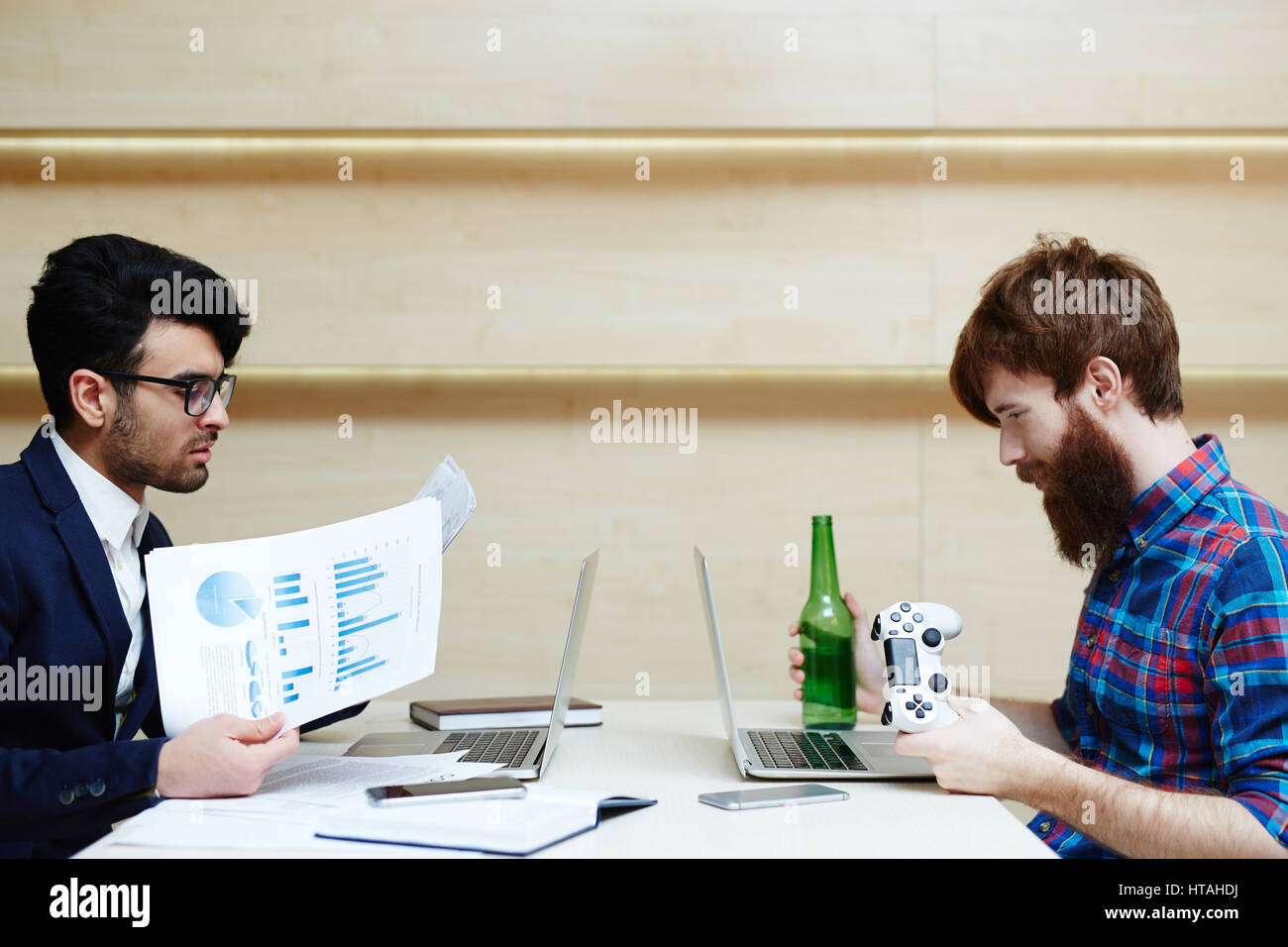 Profile view of hard-working businessman in white shirt and suit ...