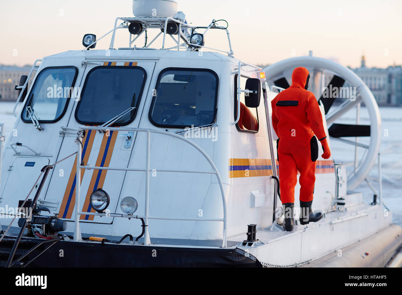 Lifeguard in uniform on coast guard boat Stock Photo - Alamy