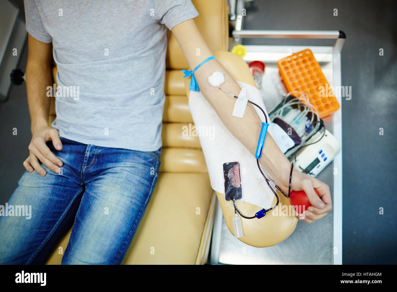 Hand gripping arm of chair hi-res stock photography and images - Alamy