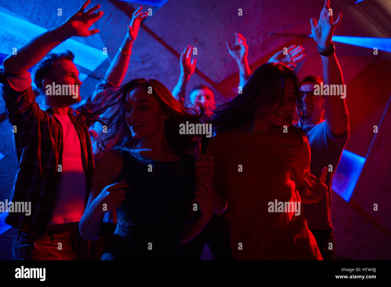 Friends enjoying celebration party in club Stock Photo - Alamy