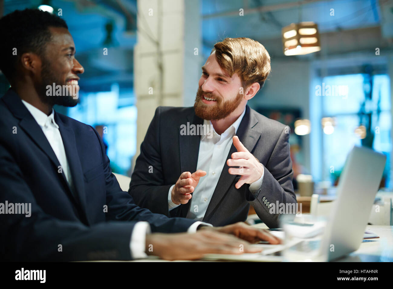 Group successful businessmen discussing hi-res stock photography and ...