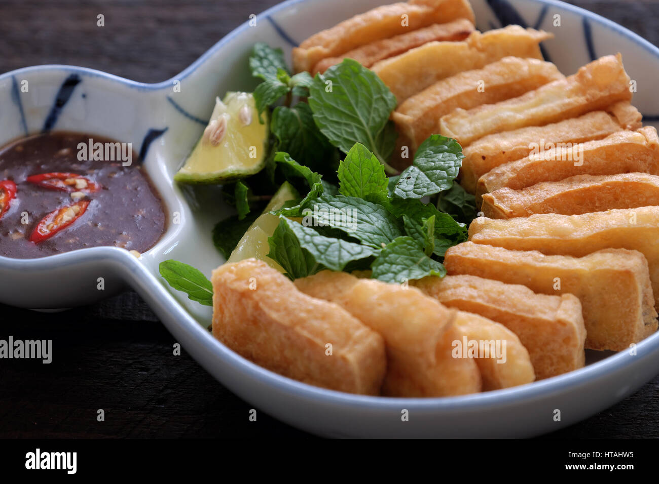 Home made food for family meal, fried tofu with shrimp paste, a very ...