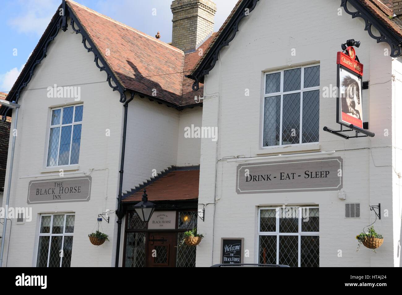 The Black Horse, Swaffham Bulbeck, Cambridgeshire, proclaims on its ...