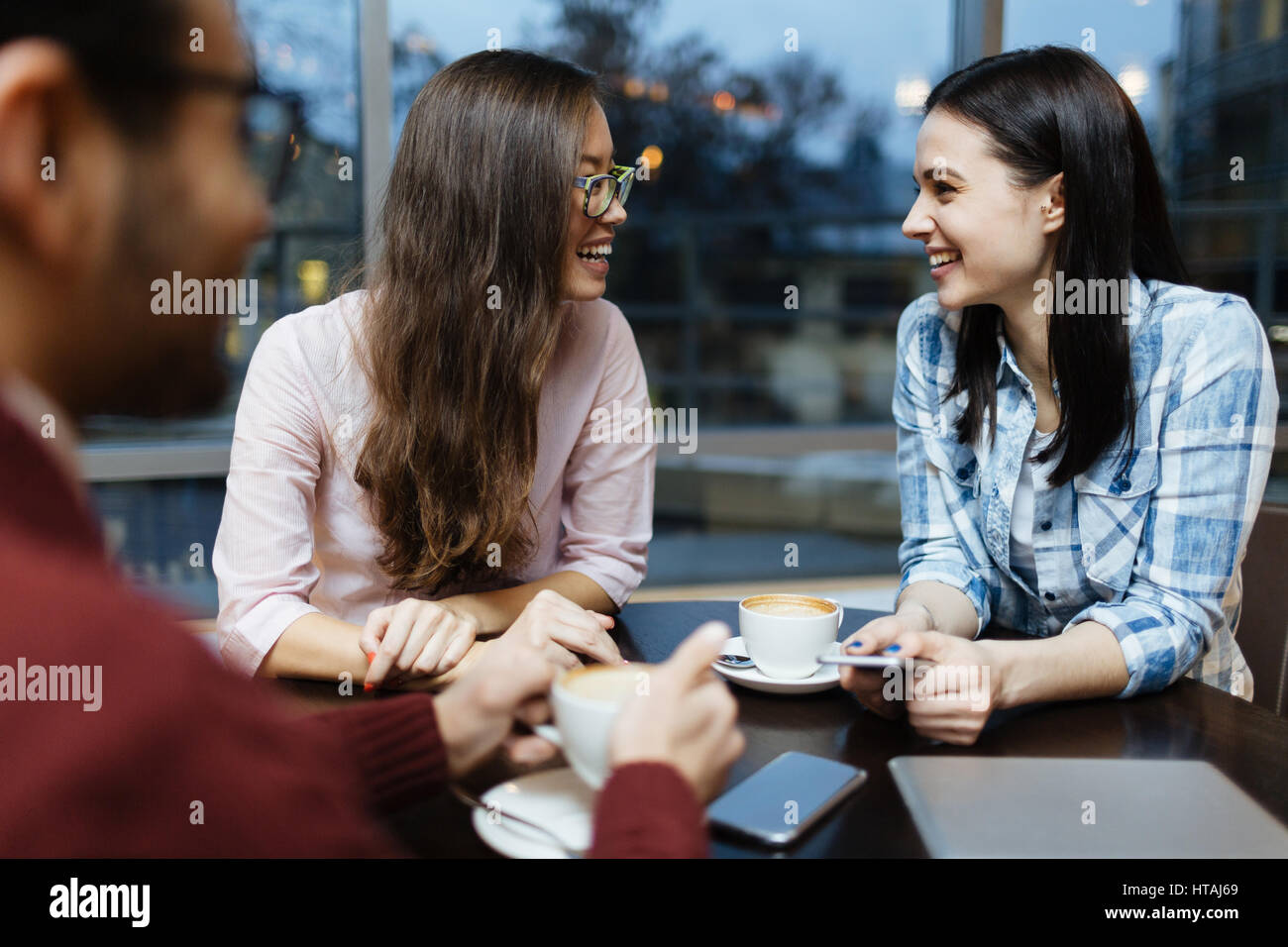 Two People At A Table