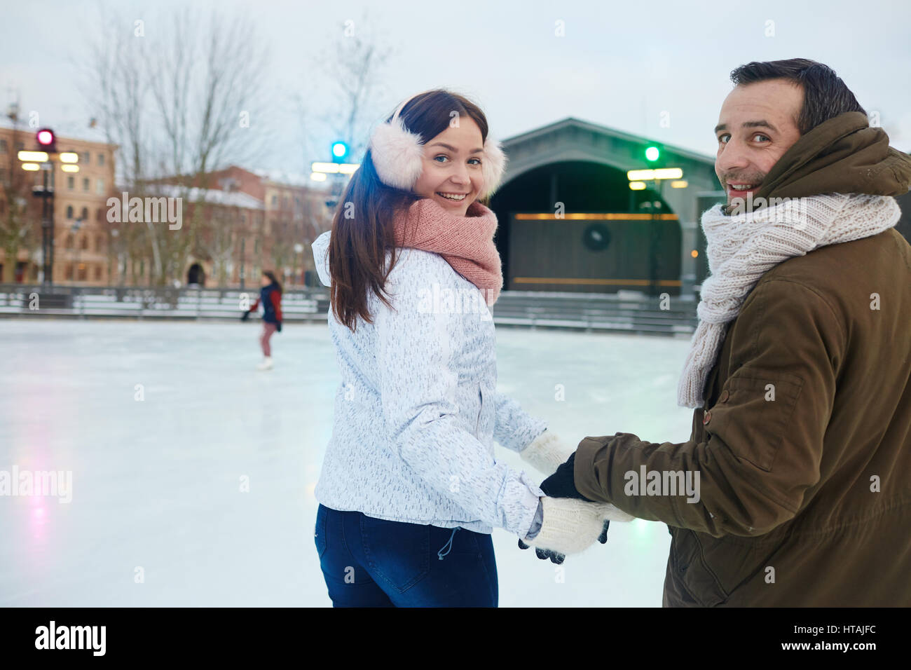 Couple skating hi-res stock photography and images - Alamy