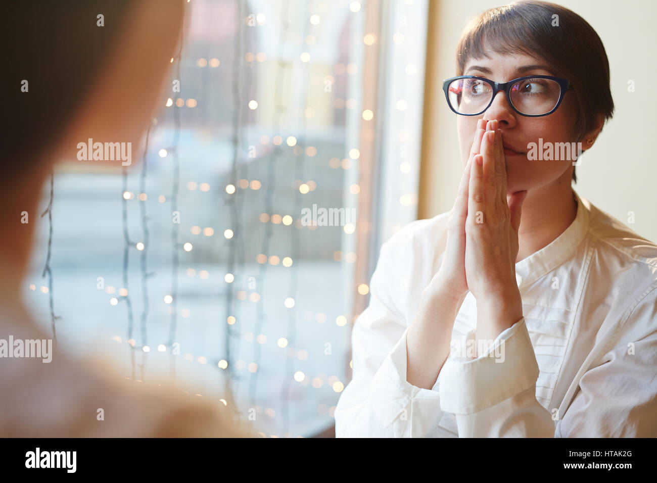 Professional young woman looking intently hi-res stock photography and ...