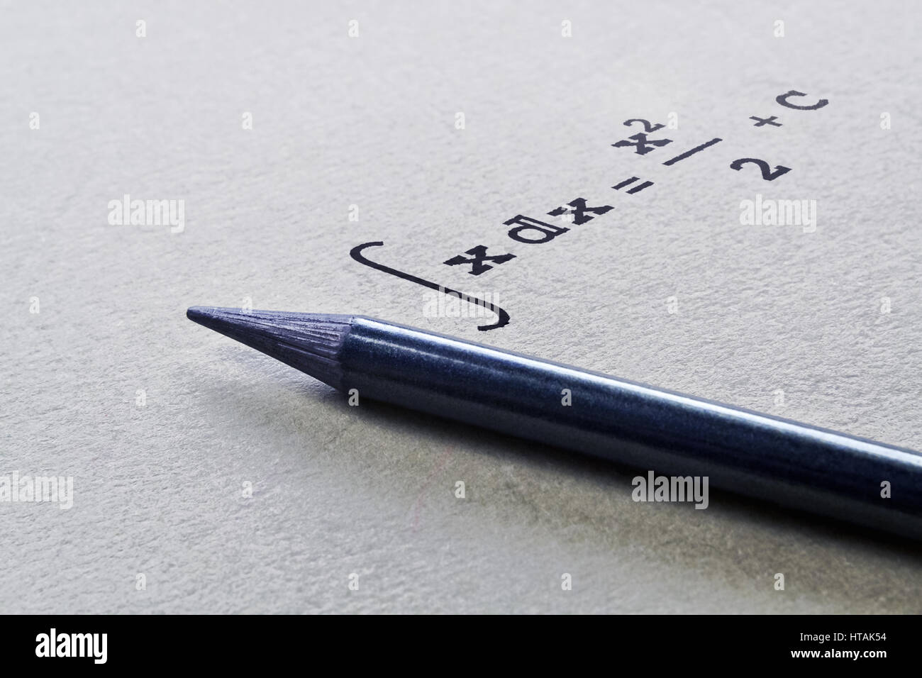 Pencil and integral of a function on bright background Stock Photo - Alamy