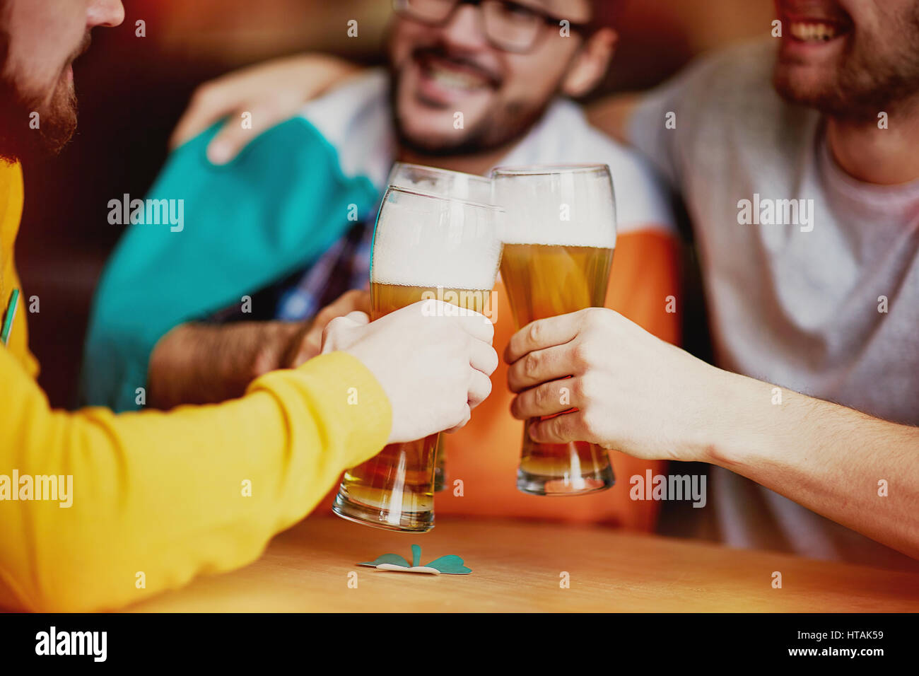 Shot glasses clinking hi-res stock photography and images - Alamy