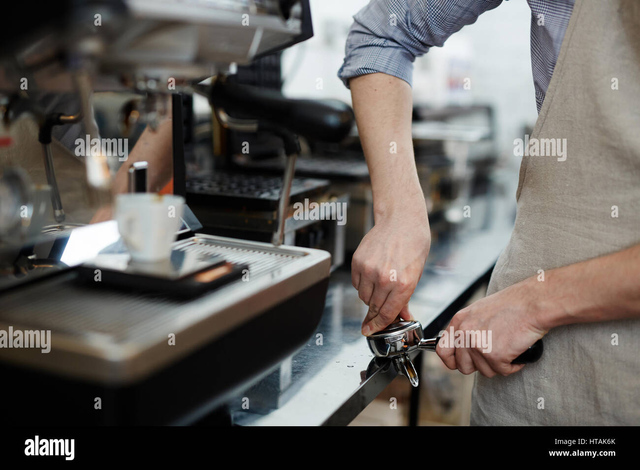 Hand barista grinding coffee beans hi-res stock photography and images - Alamy