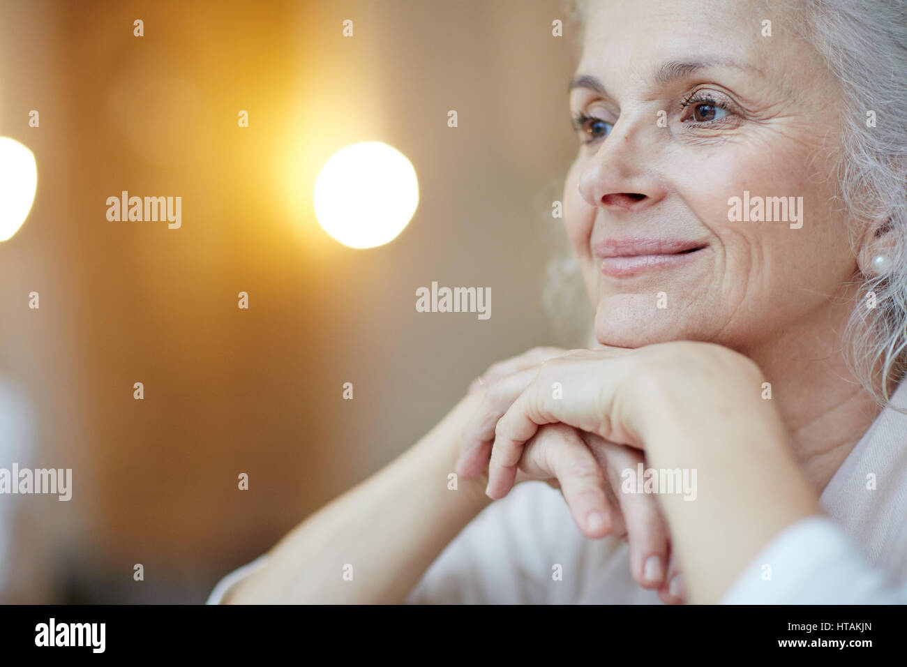 Calm senior female with relaxed expression Stock Photo - Alamy