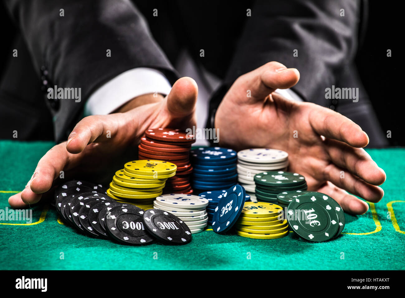 casino, gambling, poker, people and entertainment concept - close up of ...