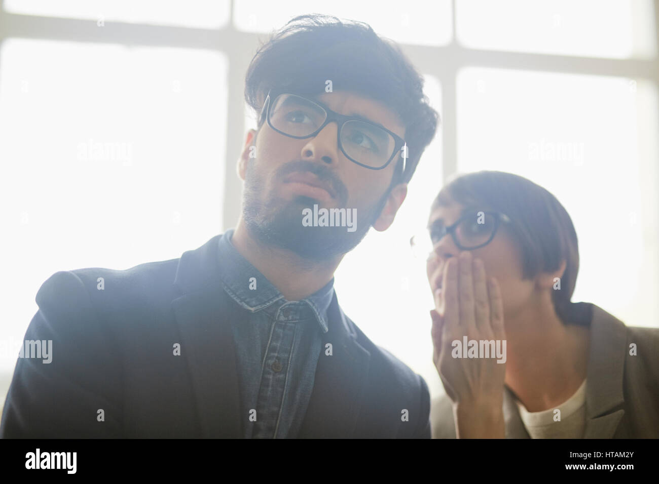 Office workers gossiping hi-res stock photography and images - Alamy