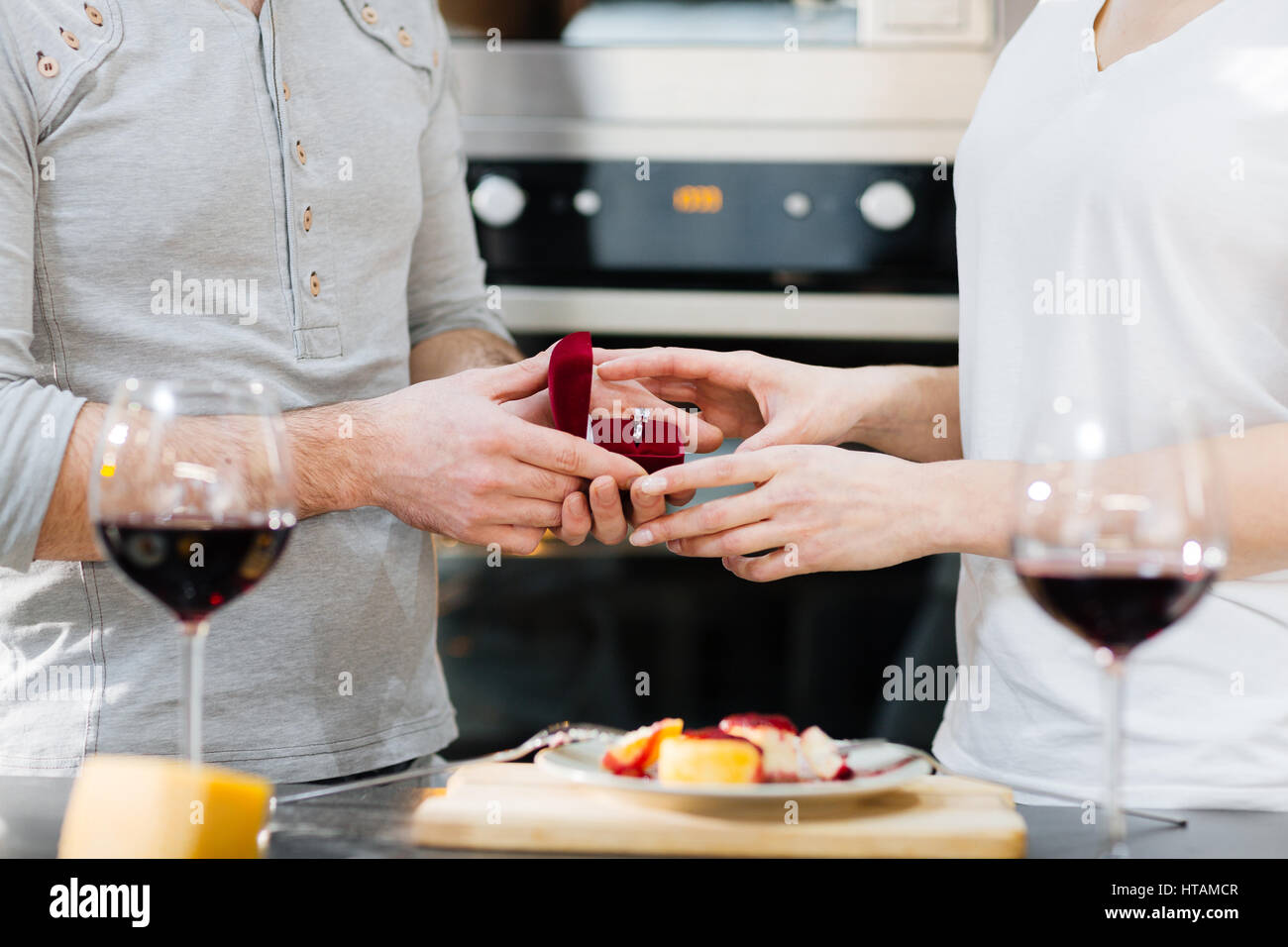 Young man making proposal to his valentine Stock Photo - Alamy