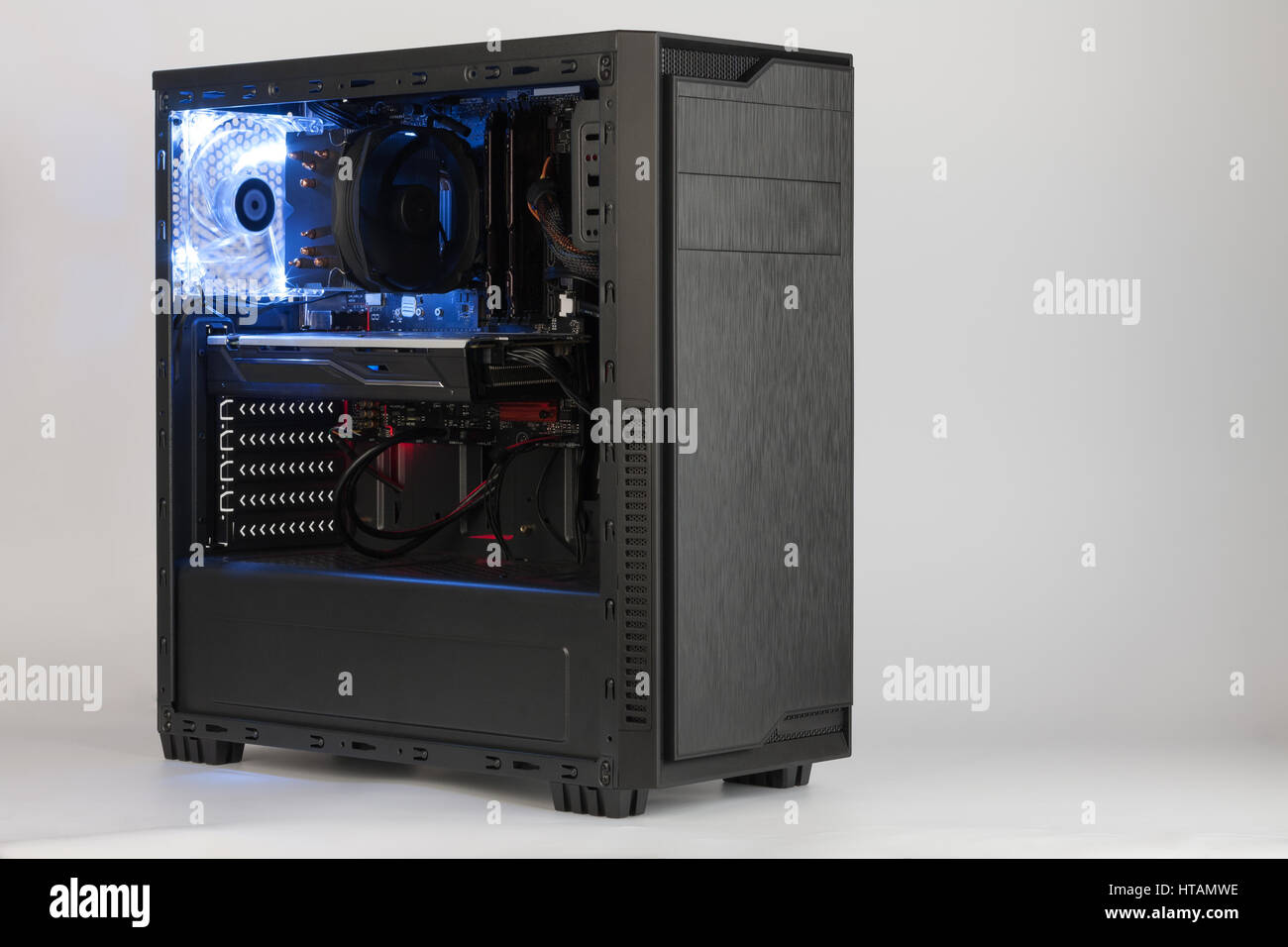 Open midi tower computer case with red and blue lighting effects on ...