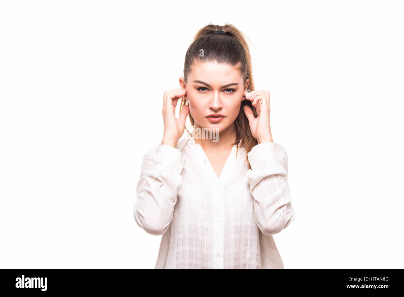 woman loud sound ears on white background Stock Photo - Alamy